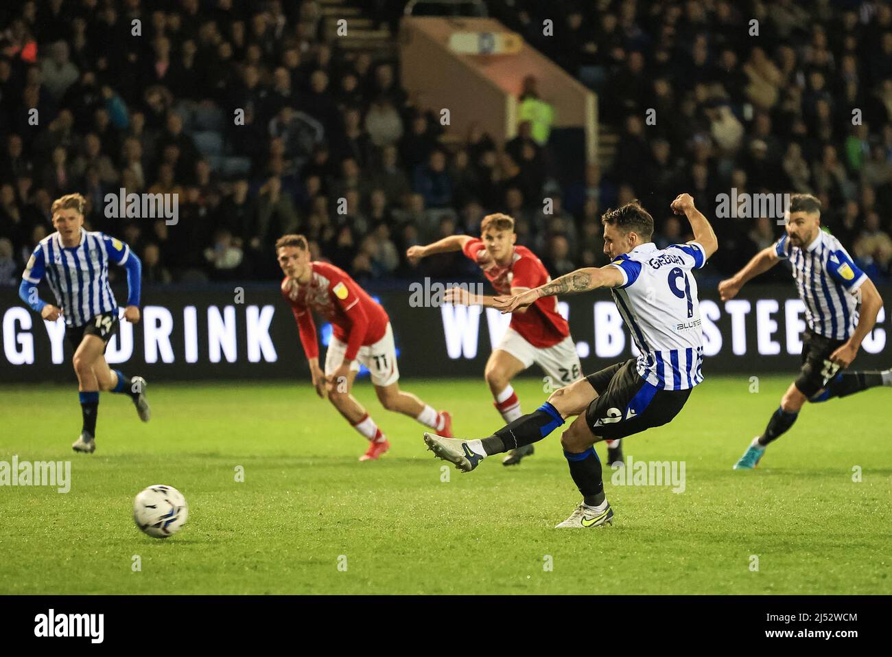 Lee Gregory #9 of Sheffield Wednesday scores a penalty to make it 1-0 ...