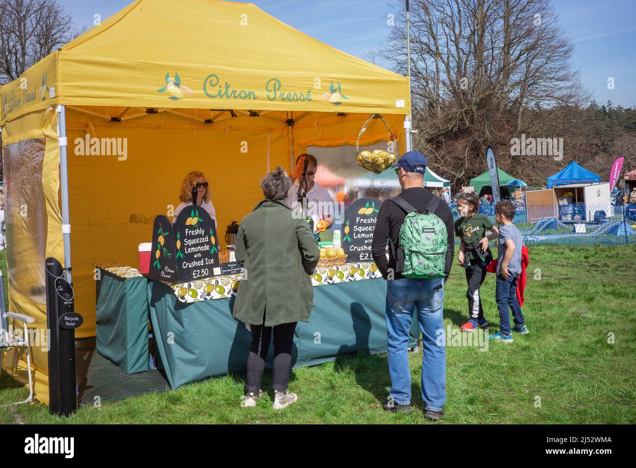 Family buying freshly squeezed lemonade from the Citron Presse catering ...