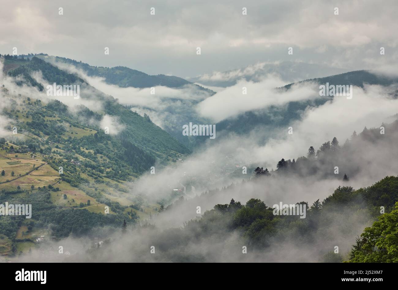 Majestic view on beautiful fog mountains in mist landscape. Dramatic ...