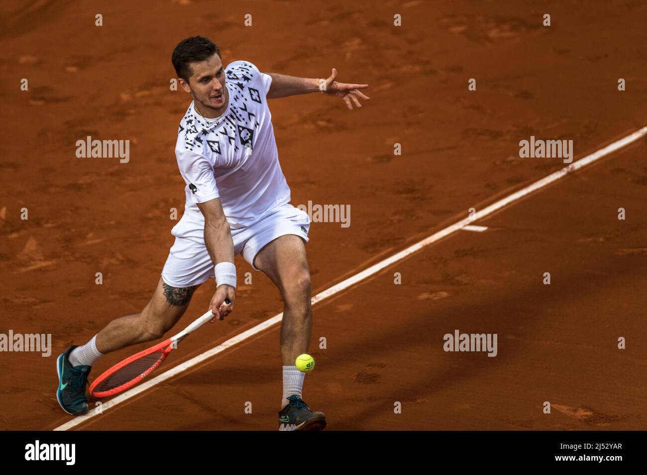 Barcelona, Spain. 19th Apr, 2022. EGOR GERASIMOV (BLR) returns the ball ...