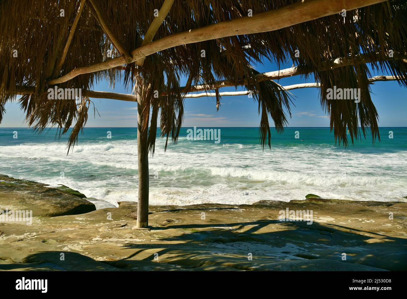 Historic landmark Windansea Surf Shack adjacent to waves and surf along ...