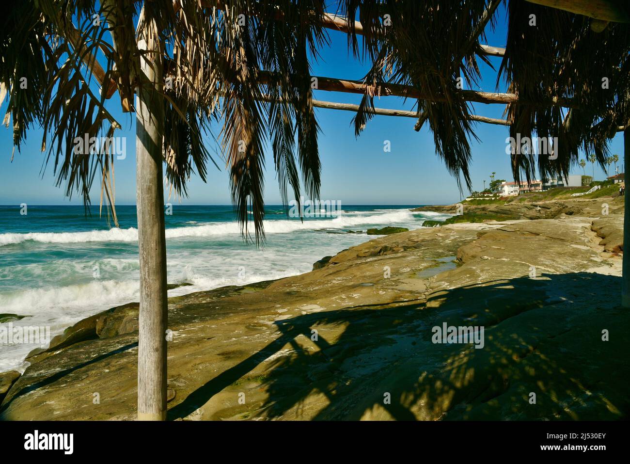 Historic landmark Windansea Surf Shack adjacent to waves and surf along ...