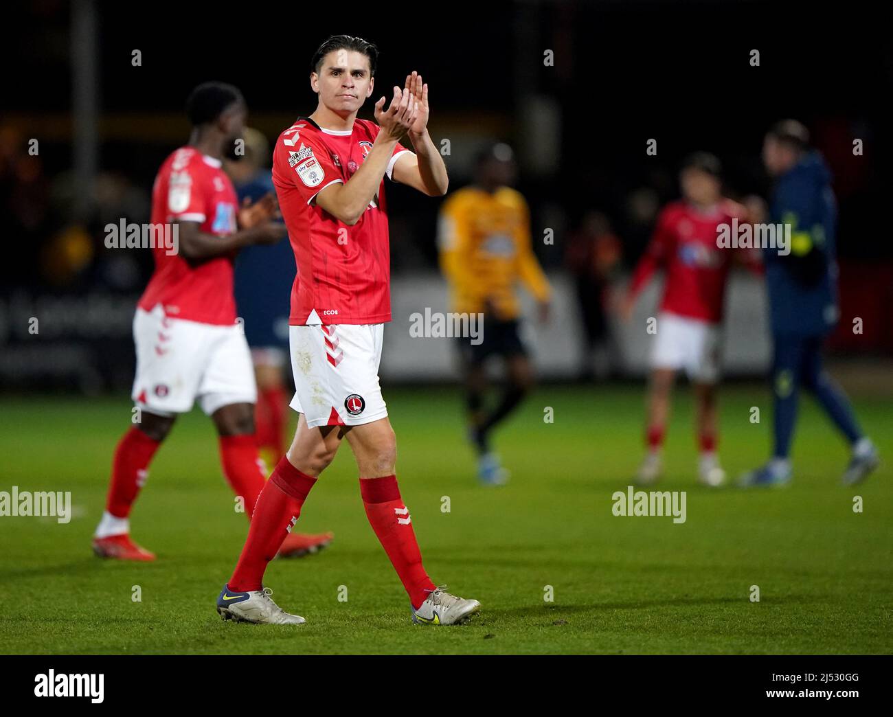 Charlton Athletic's George Dobson applauds the fans at full time after ...
