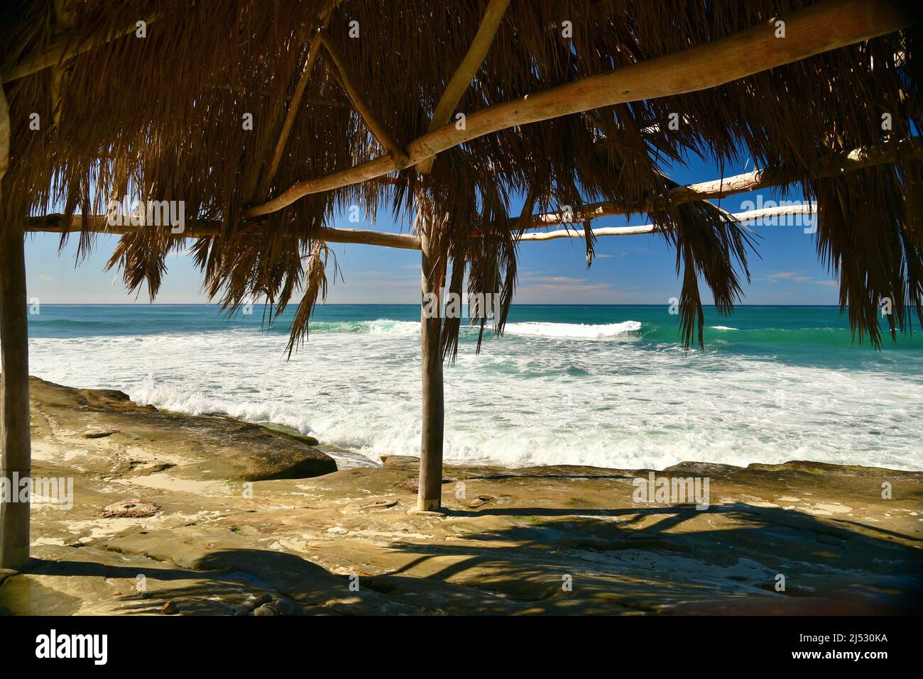 Historic landmark Windansea Surf Shack adjacent to waves and surf along ...