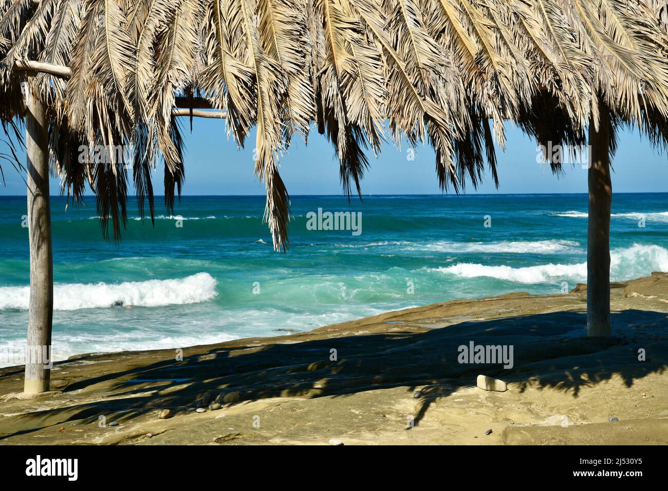 Historic landmark Windansea Surf Shack adjacent to waves and surf along ...