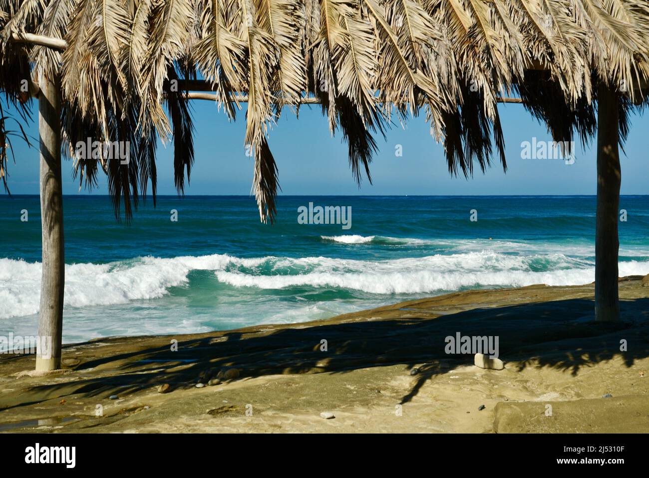 Historic landmark Windansea Surf Shack adjacent to waves and surf along ...