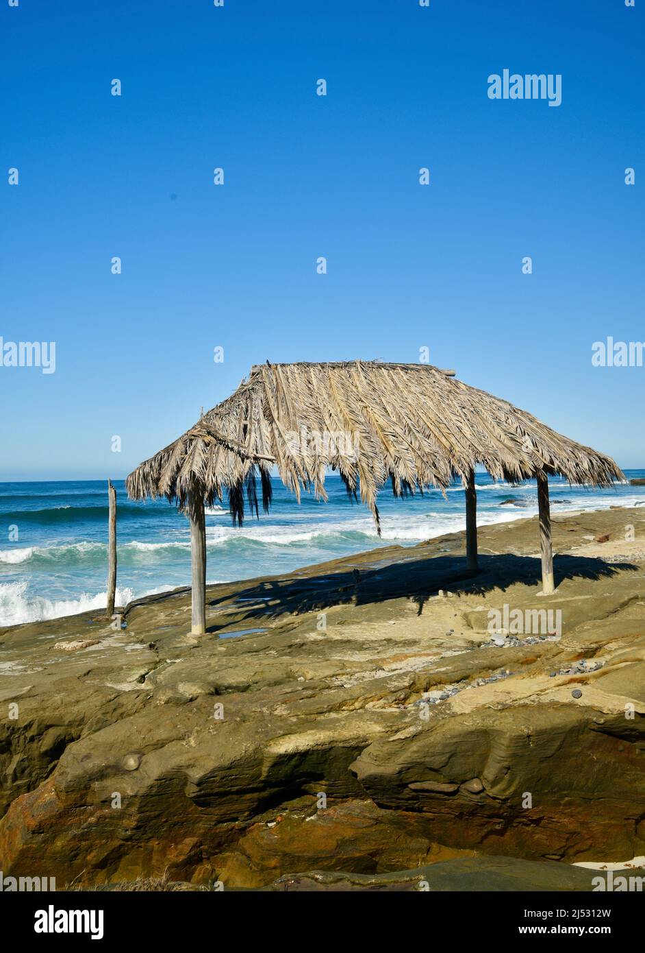 Historic landmark Windansea Surf Shack adjacent to waves and surf along ...