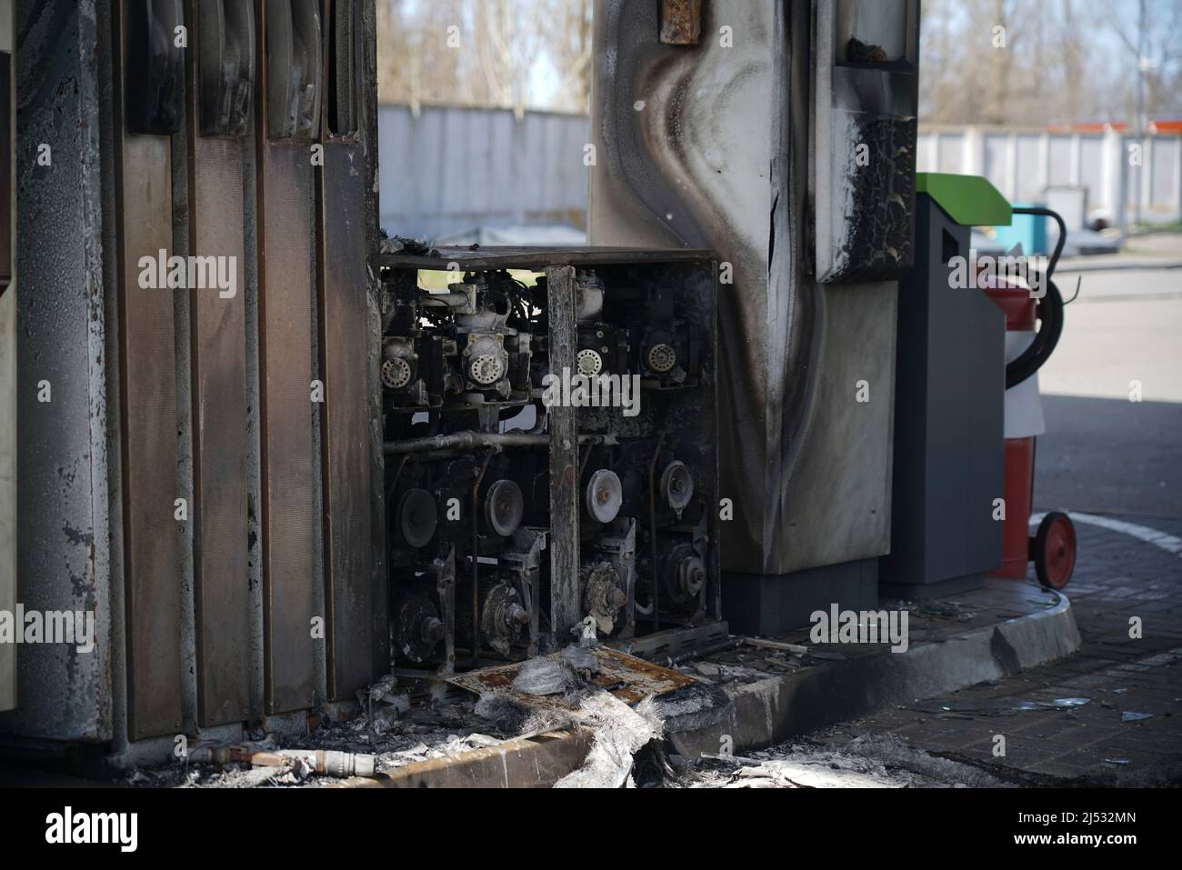Gas station with a broken station from a shell explosion. Exploded gas ...
