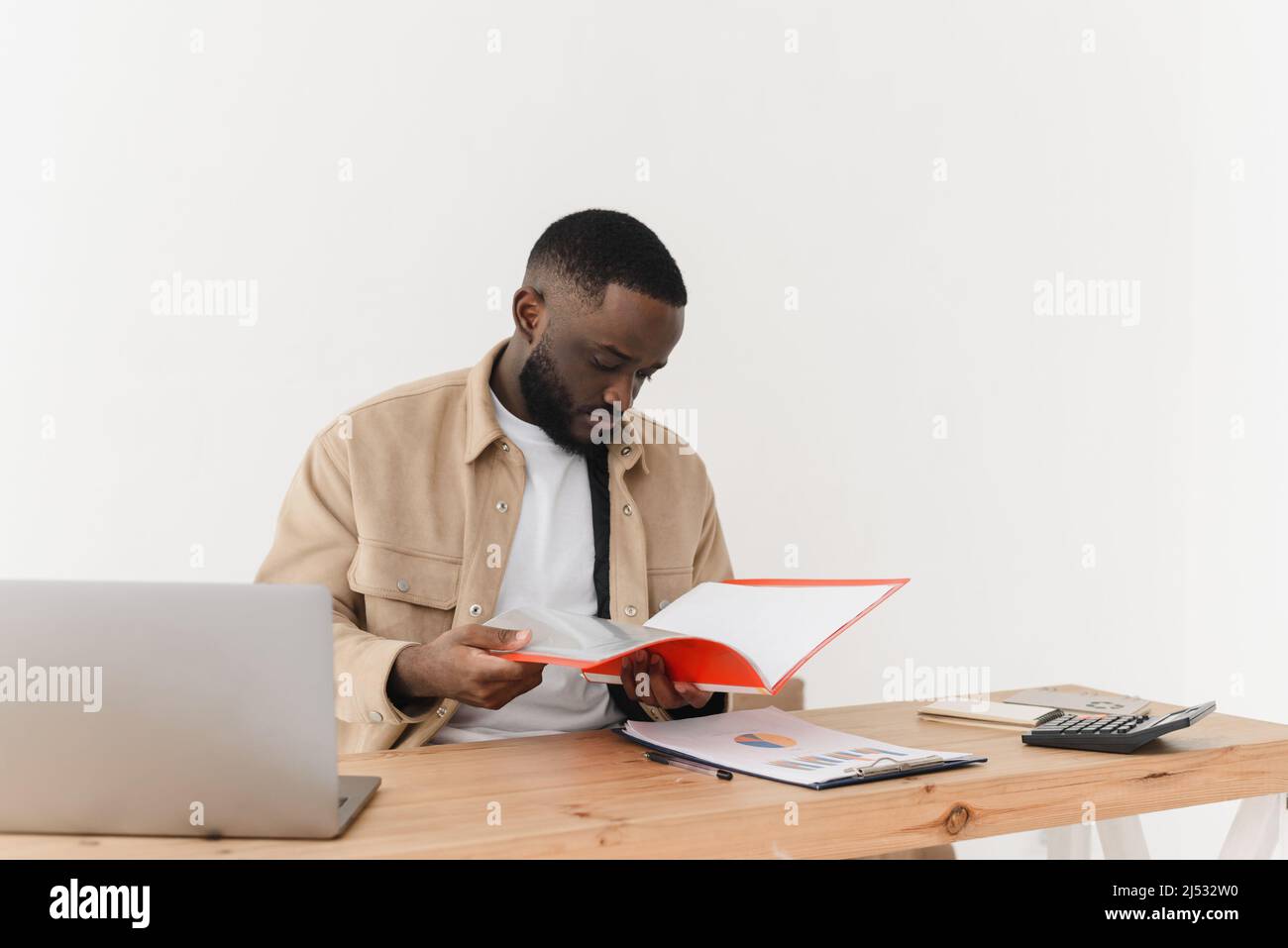 African american man reading hi-res stock photography and images - Alamy
