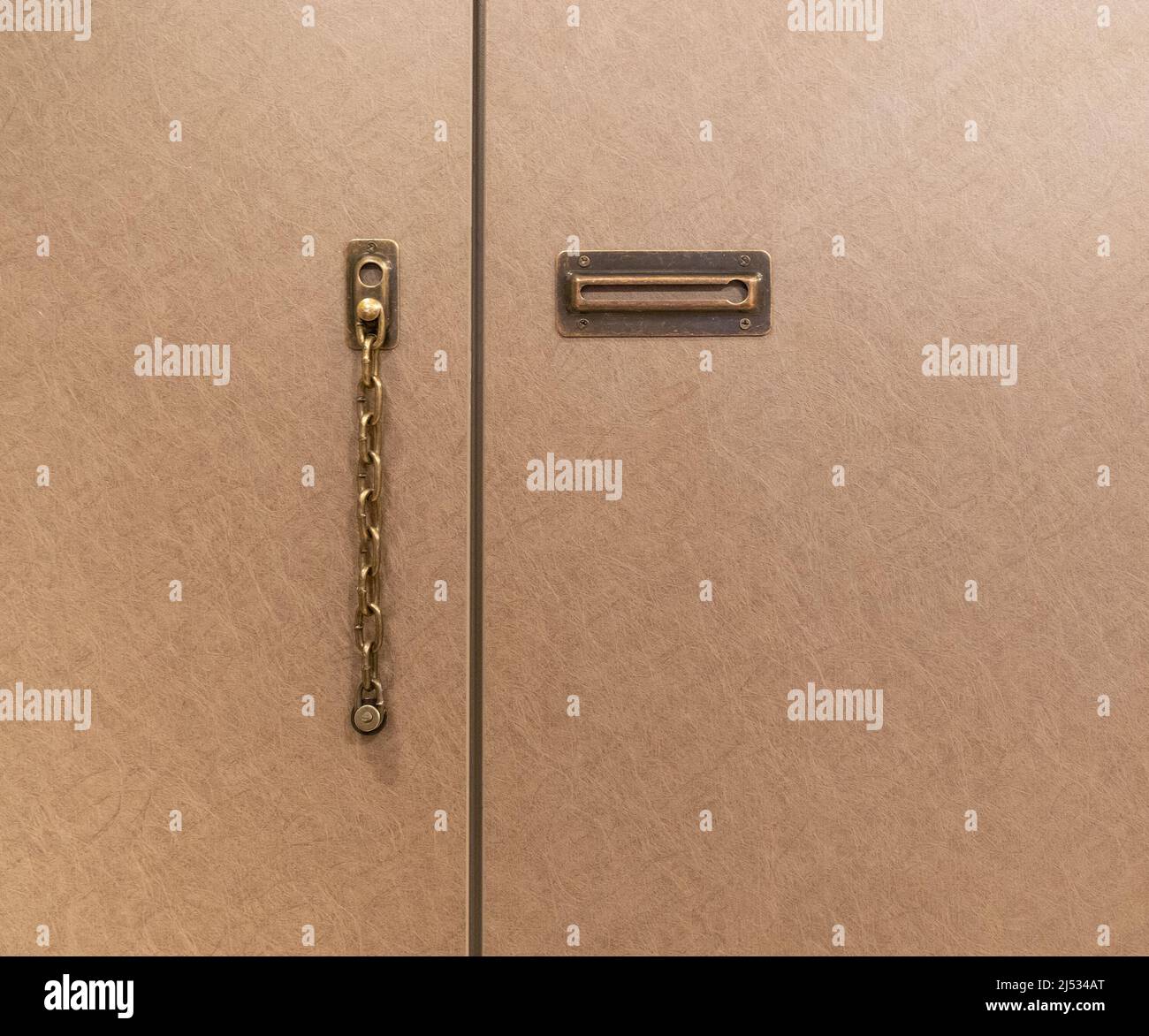 chain for locking the door in the open state Stock Photo - Alamy