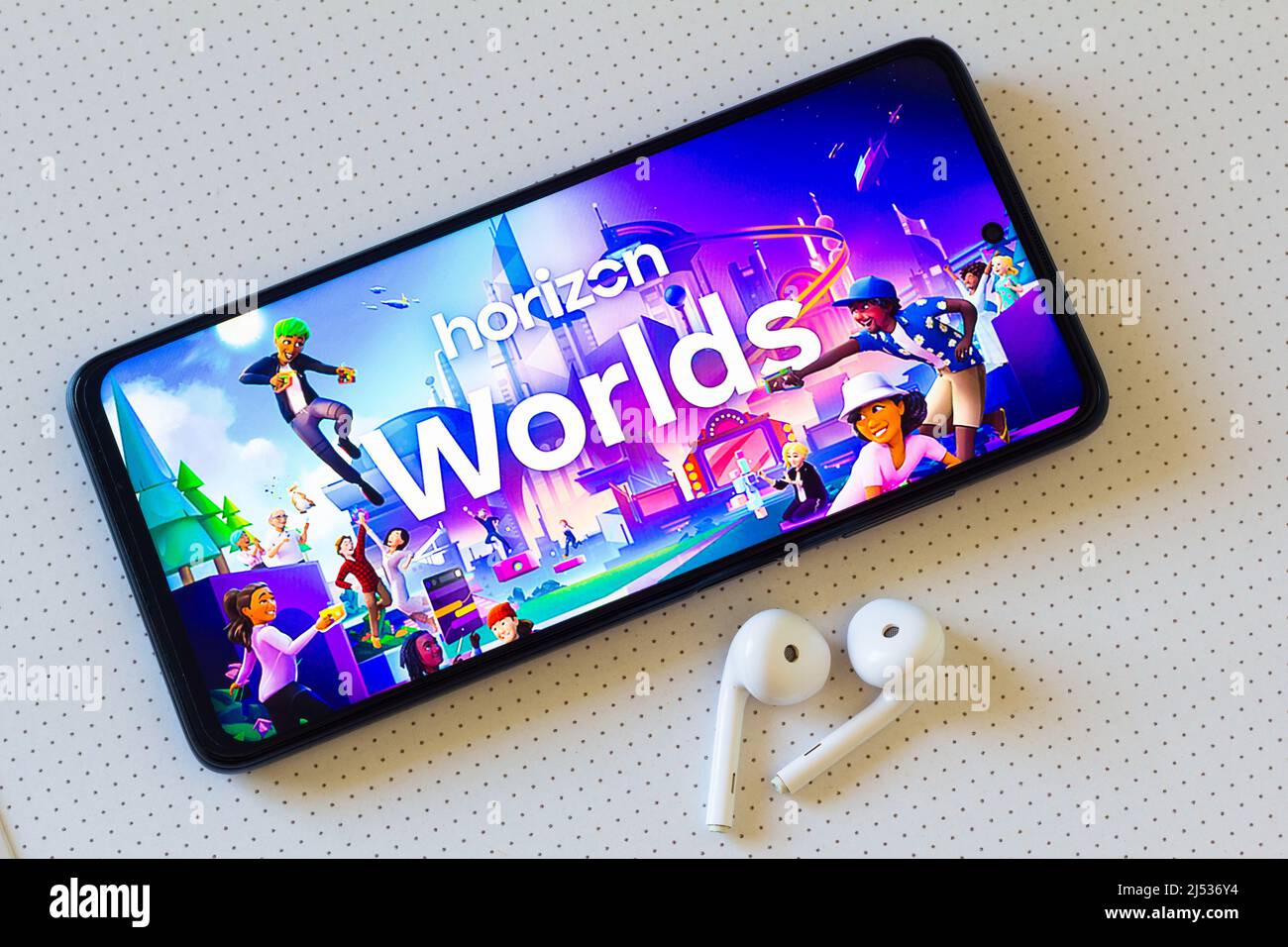 In this photo illustration the Meta Horizon Worlds logo seen displayed ...