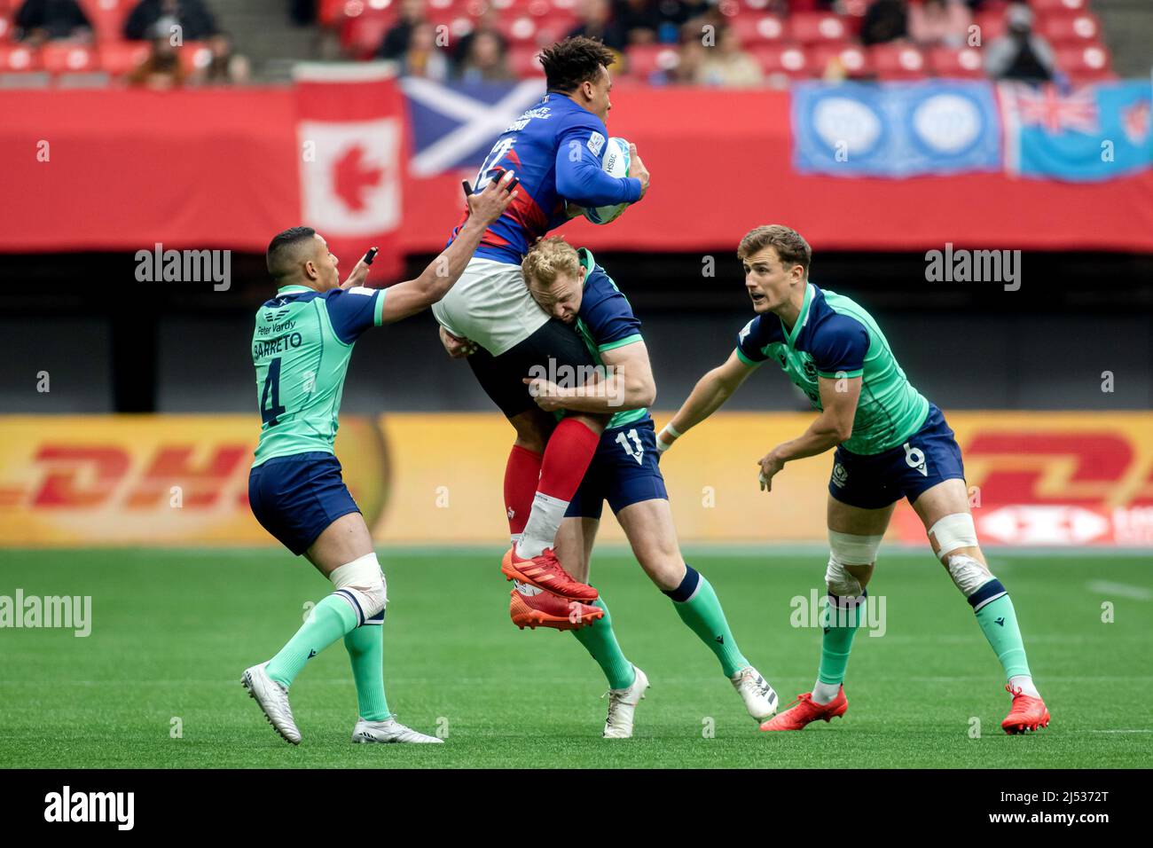 Vancouver, Canada, April 16, 2022: Jordan Sepho (middle, holding ball ...