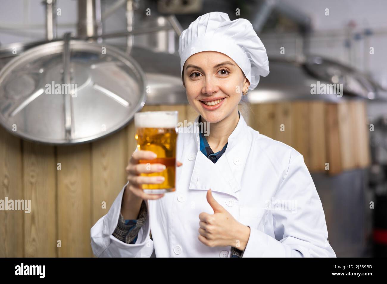Woman brewmaster glass beer hi-res stock photography and images - Alamy
