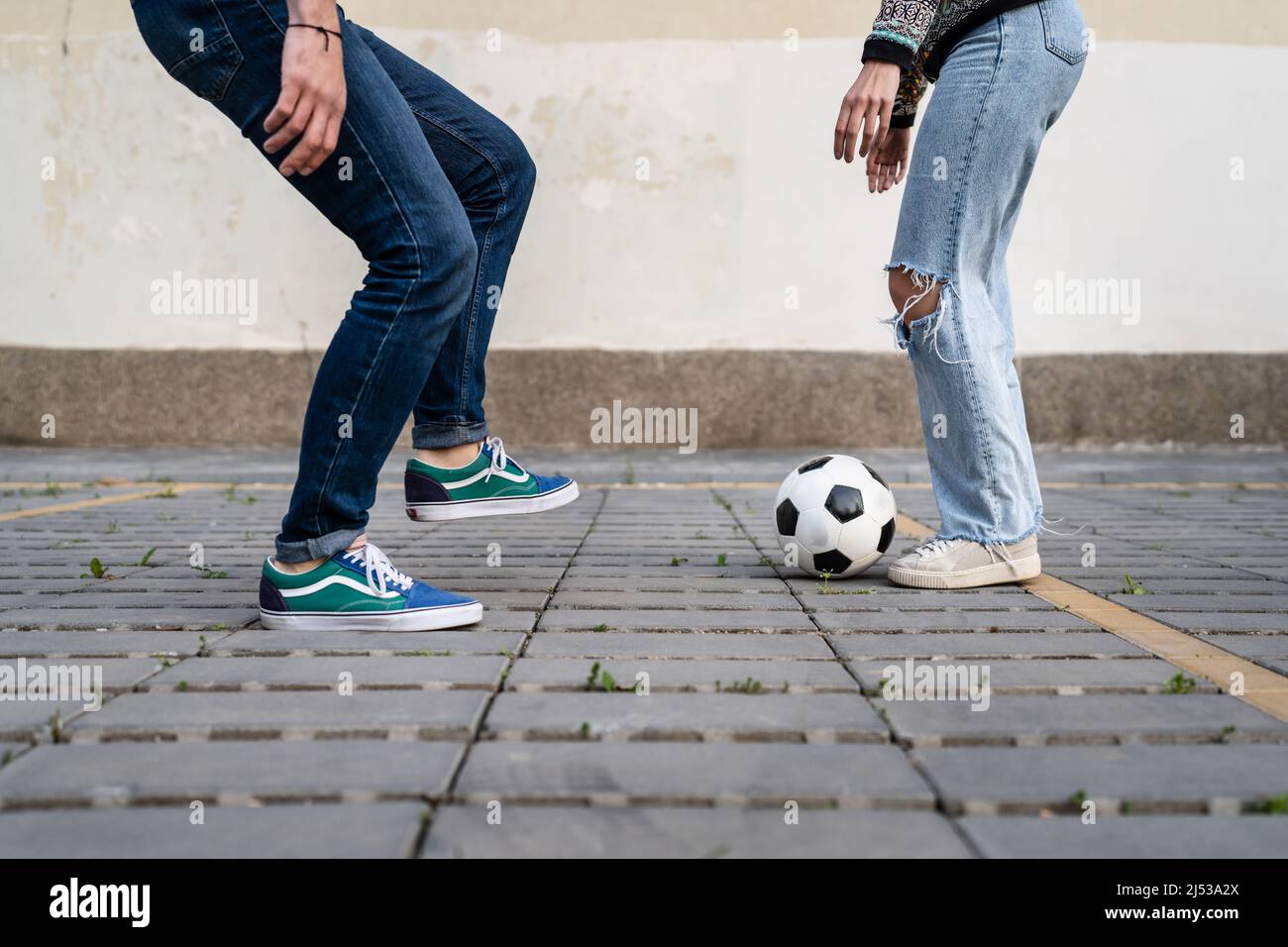 Woman kicking man hi-res stock photography and images - Alamy