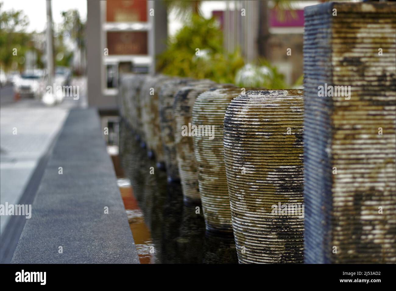 Row of water fountain vast along Cenang street in Langkawi Stock Photo ...