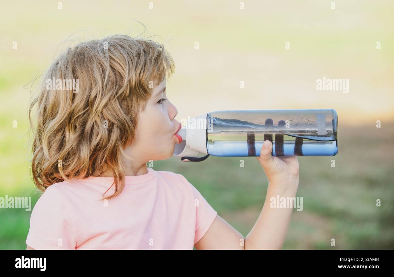 Stay hydrated. Child with bottle of water Stock Photo - Alamy