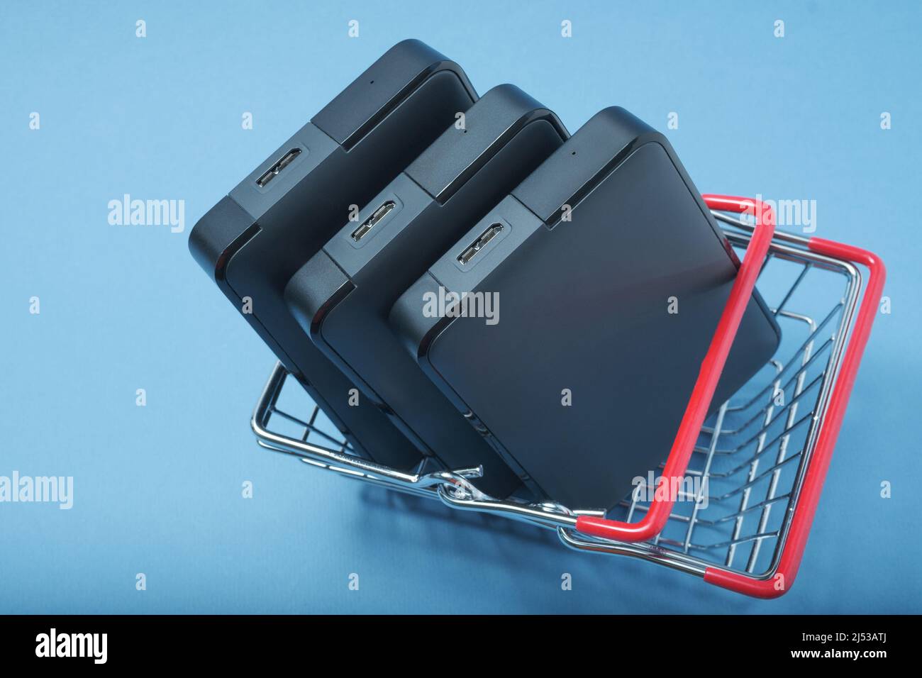 A stack of hard drives in a basket Stock Photo - Alamy