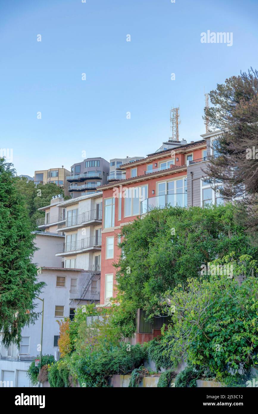 Layered apartment buildings on a slope at San Francisco, California ...