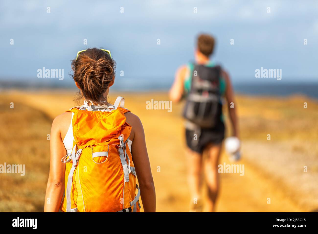 Couple backpacks walking in desert hi-res stock photography and images ...
