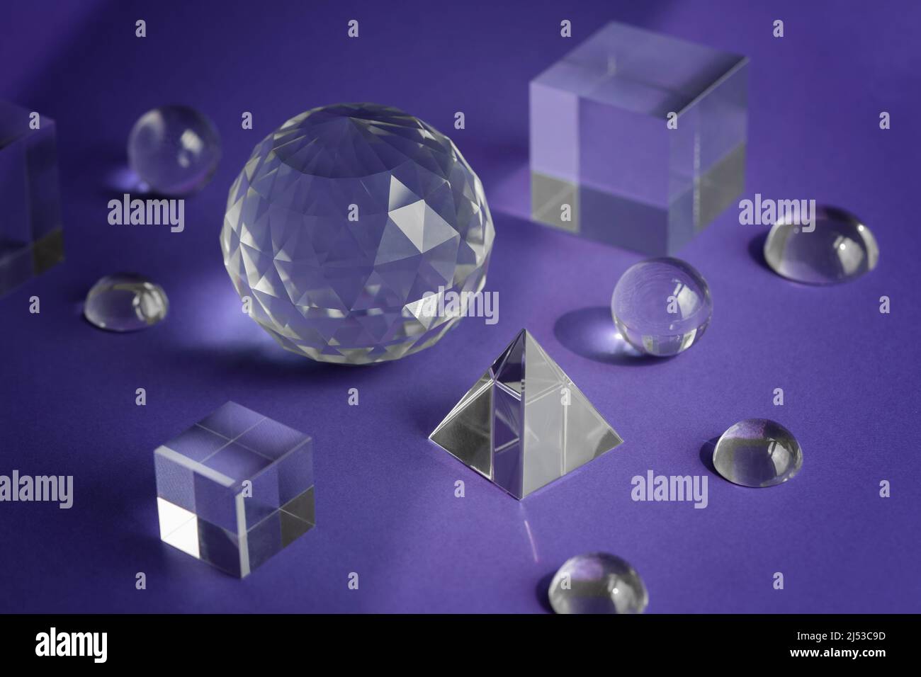 Crystal prism refracting light, magic crystals and pyramid, sphere and ...