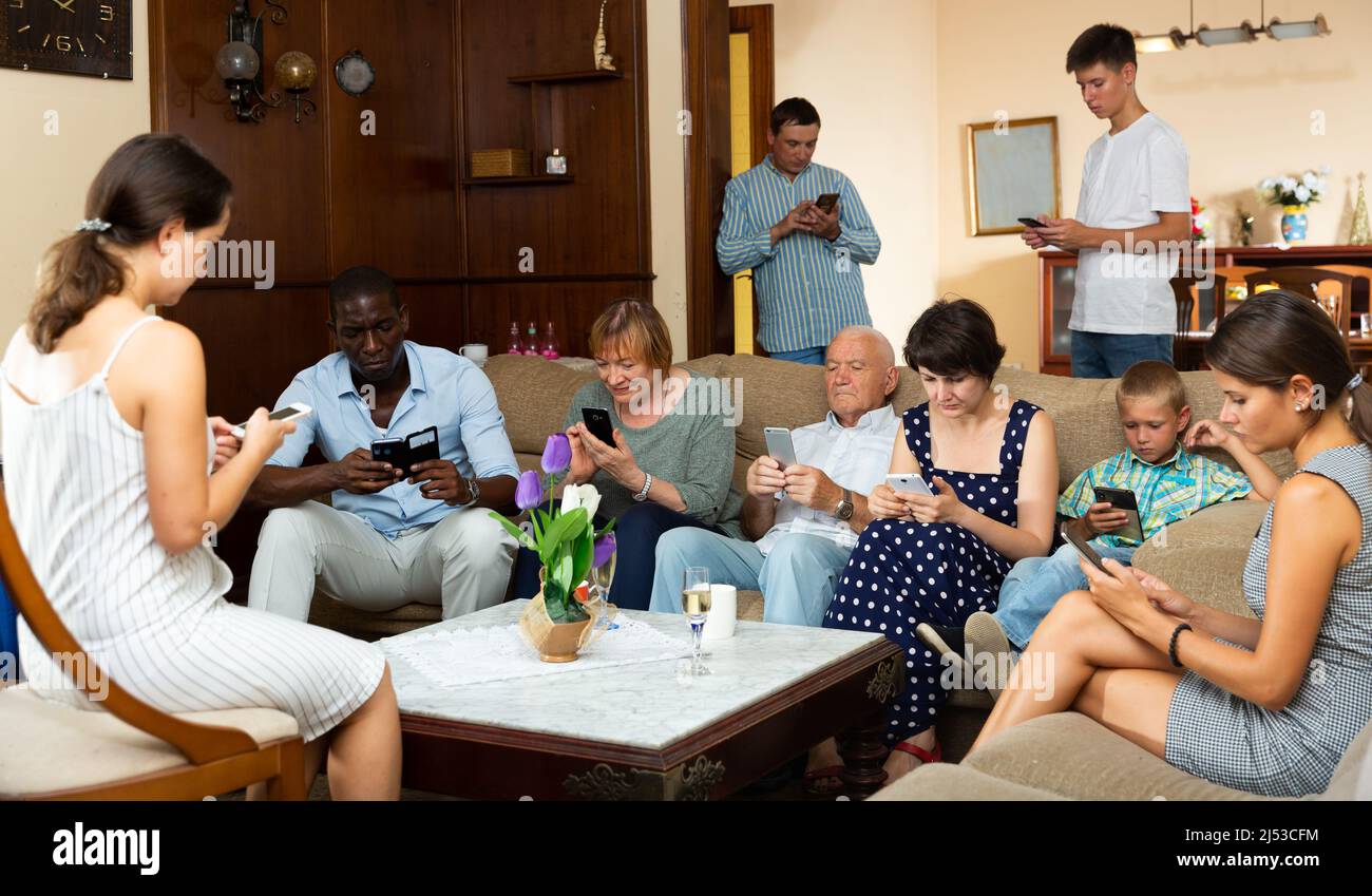 Family addicted to phones hi-res stock photography and images - Alamy