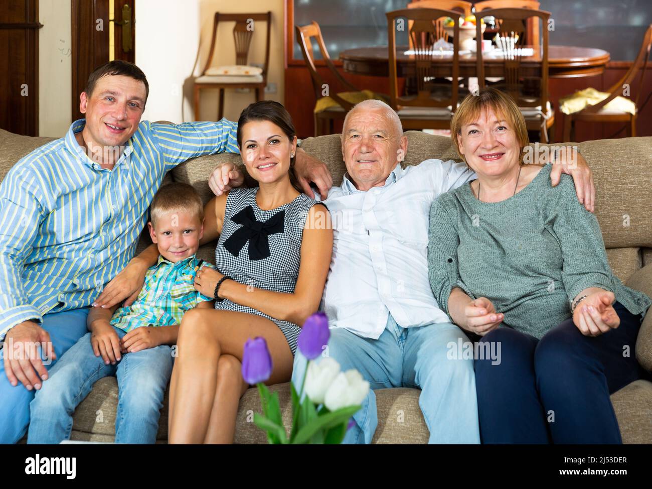 Happy family with grandparents Stock Photo - Alamy