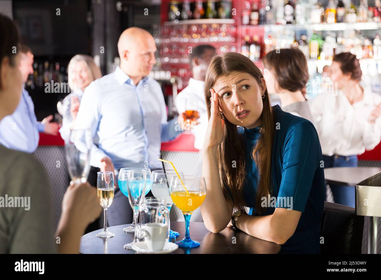Bored woman at party Stock Photo - Alamy