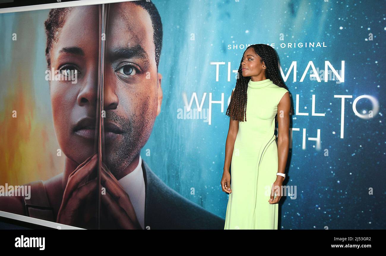 Instanding brown lime green dress hi-res stock photography and images ...