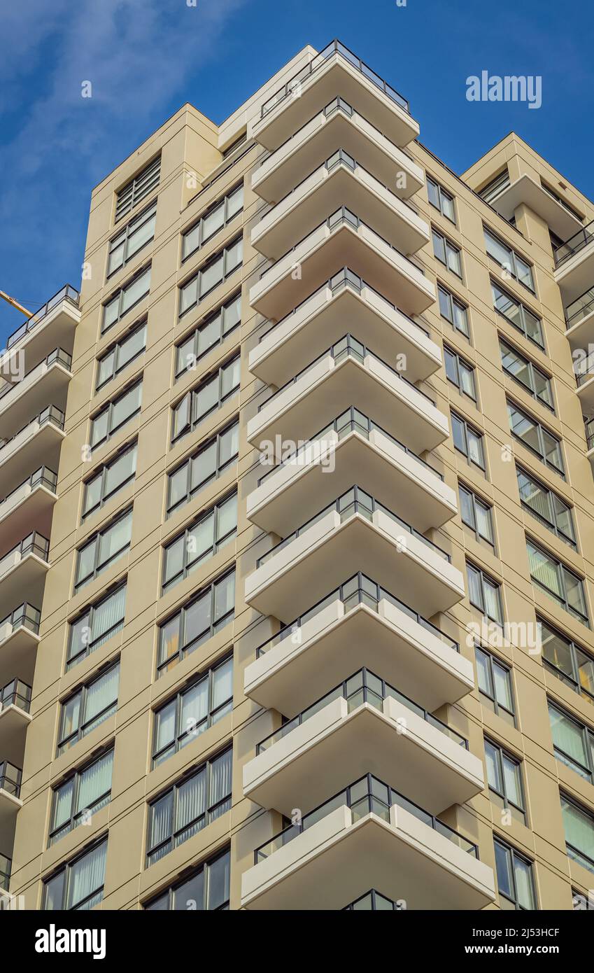 Facade detail of a modern high-rise apartment building. Abstract ...