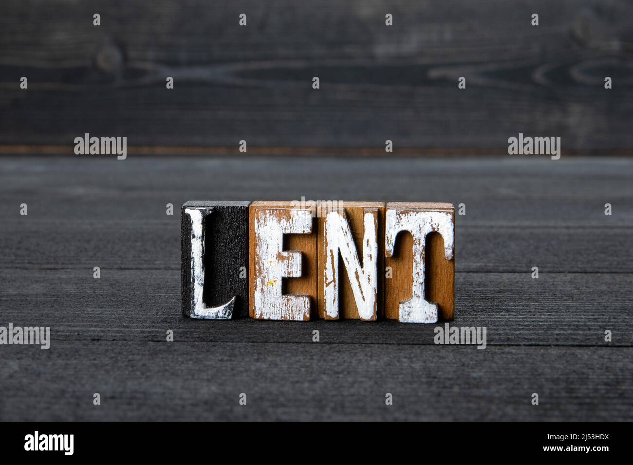 LENT. Text from alphabet letters on a black wooden background Stock ...