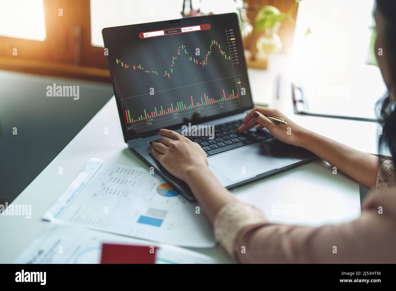 Financial and investment planning concept, female businesswoman using ...