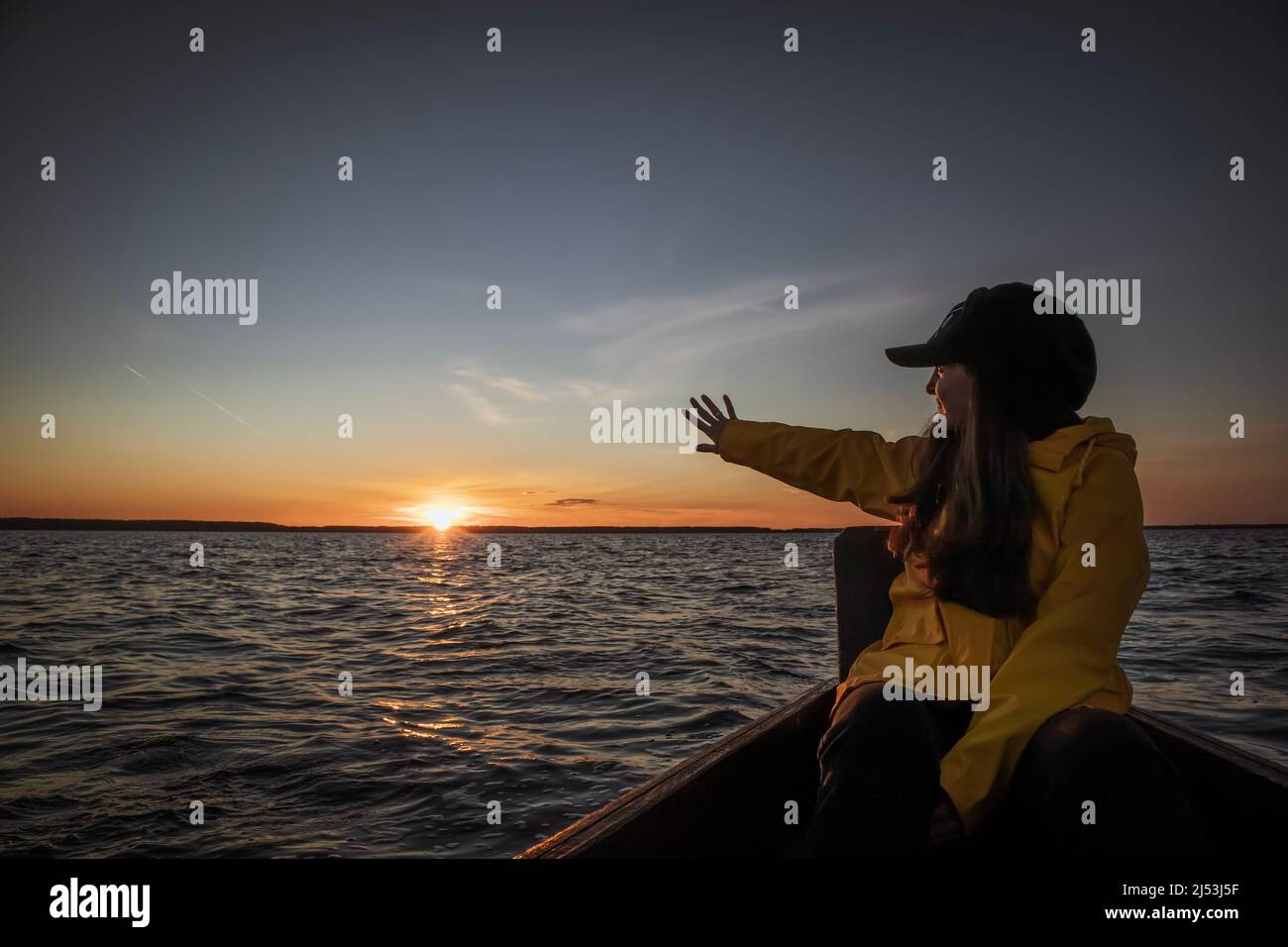 Young girl waving goodbye hi-res stock photography and images - Alamy