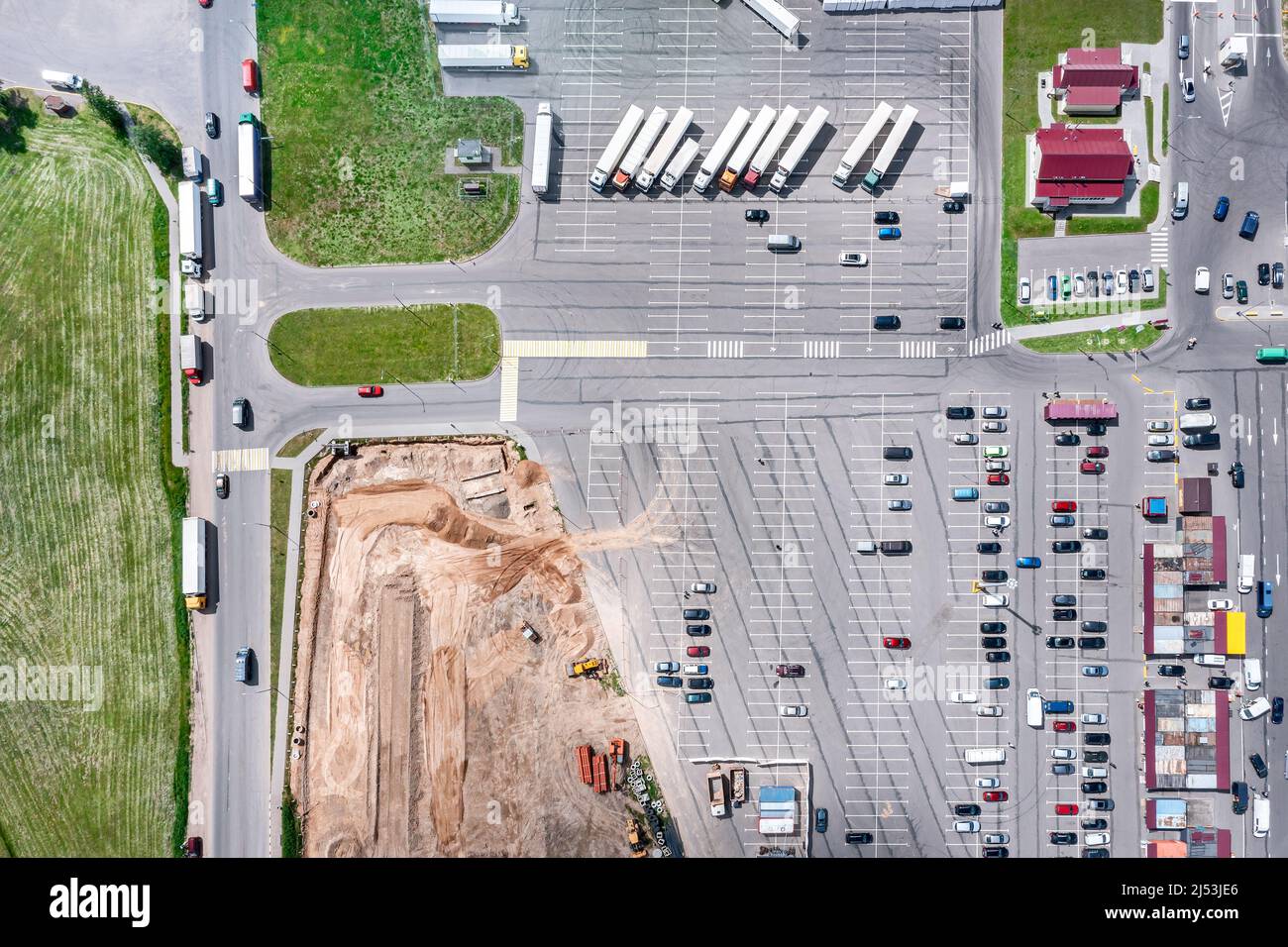 outdoor parking lot in residential area with vacant places. aerial top ...