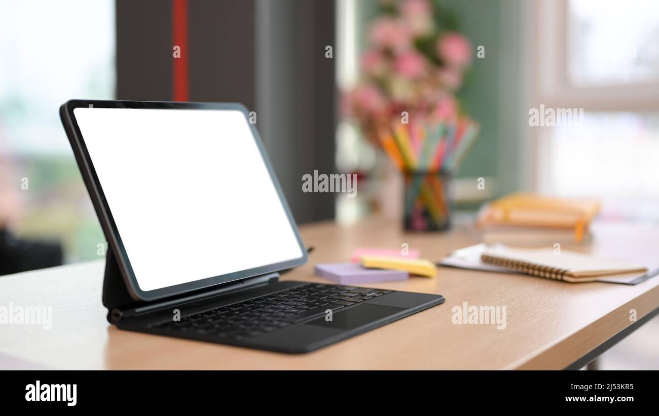 Close-up image, Portable digital tablet touchpad white screen mockup ...