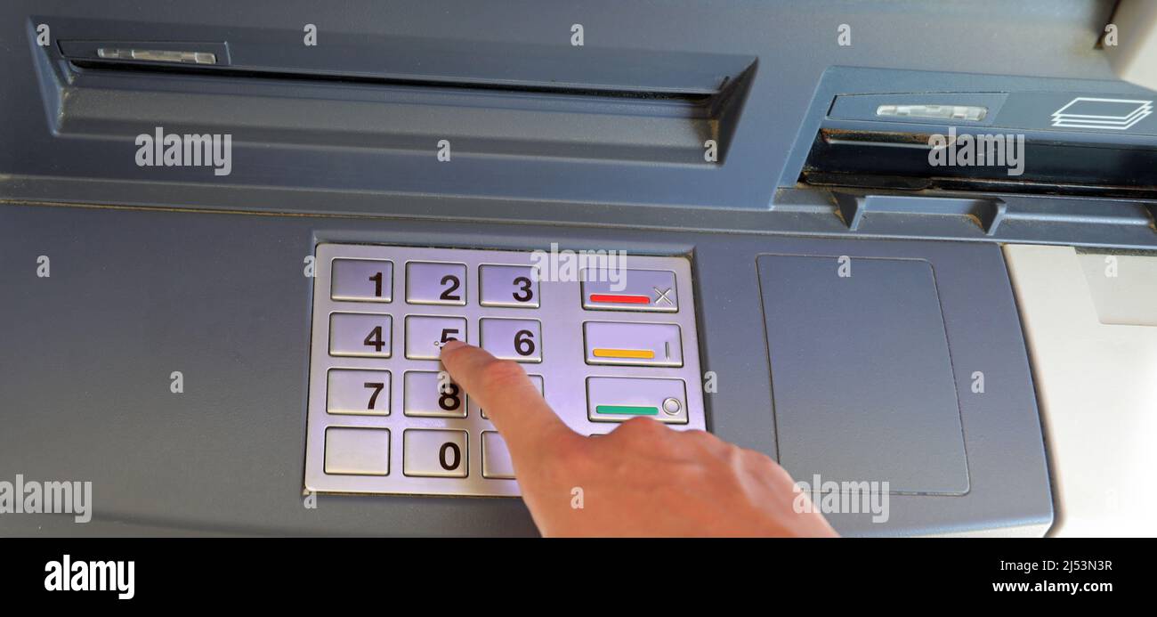 forefinger typing secret pin into numeric keypad Stock Photo - Alamy