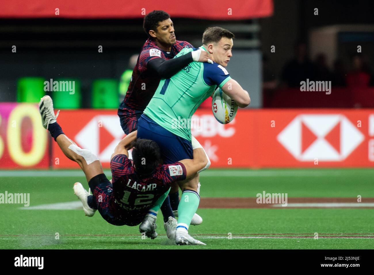 Vancouver, Canada, April 17, 2022: Jordan Edmunds (right, holding ball ...