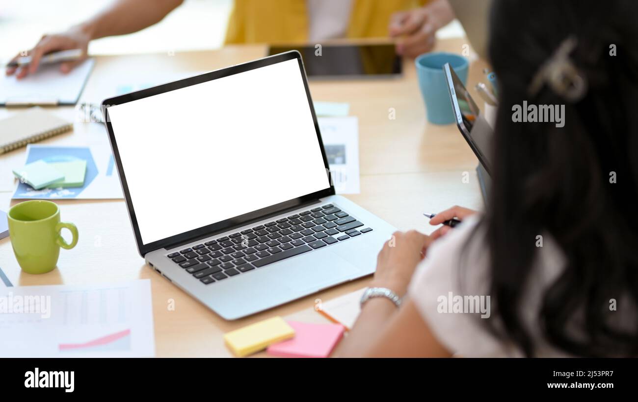 Close-up, backside image, Laptop computer white screen mockup is on a ...