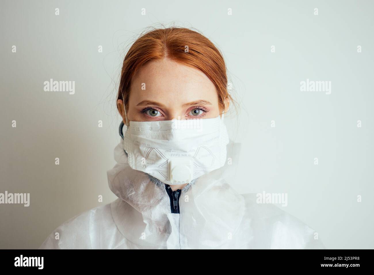 virologist woman in chemical protection mask ,glasses and gloves ...