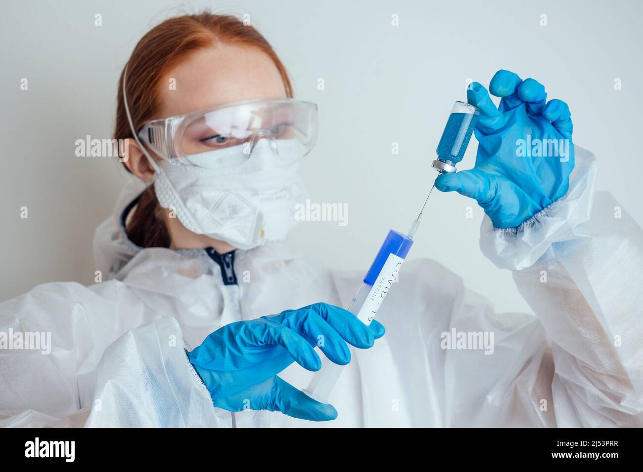 virologist woman in chemical protection mask ,glasses and gloves ...