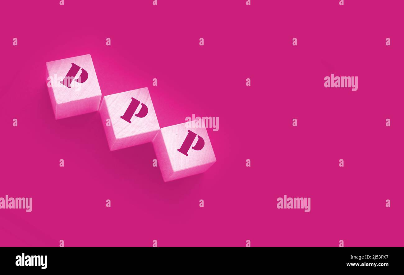 concept word PPP on wooden cubes on a blue background. Technology ...