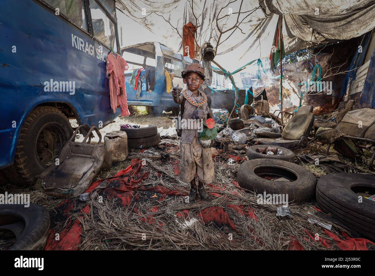 A young boy dressed in his post-apocalyptic costume poses for a photo ...