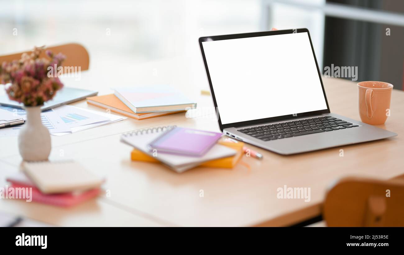 Close-up, Workspace in the cafe with laptop computer white screen ...