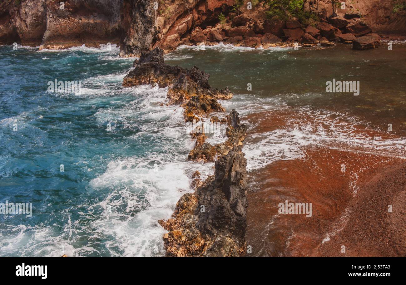 Red Sand Beach, Maui in in Hawaiian. Sea Wave and rock, summer beach ...