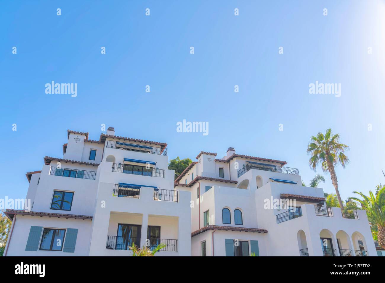 Two identical residential buildings with mediterranean style exterior ...