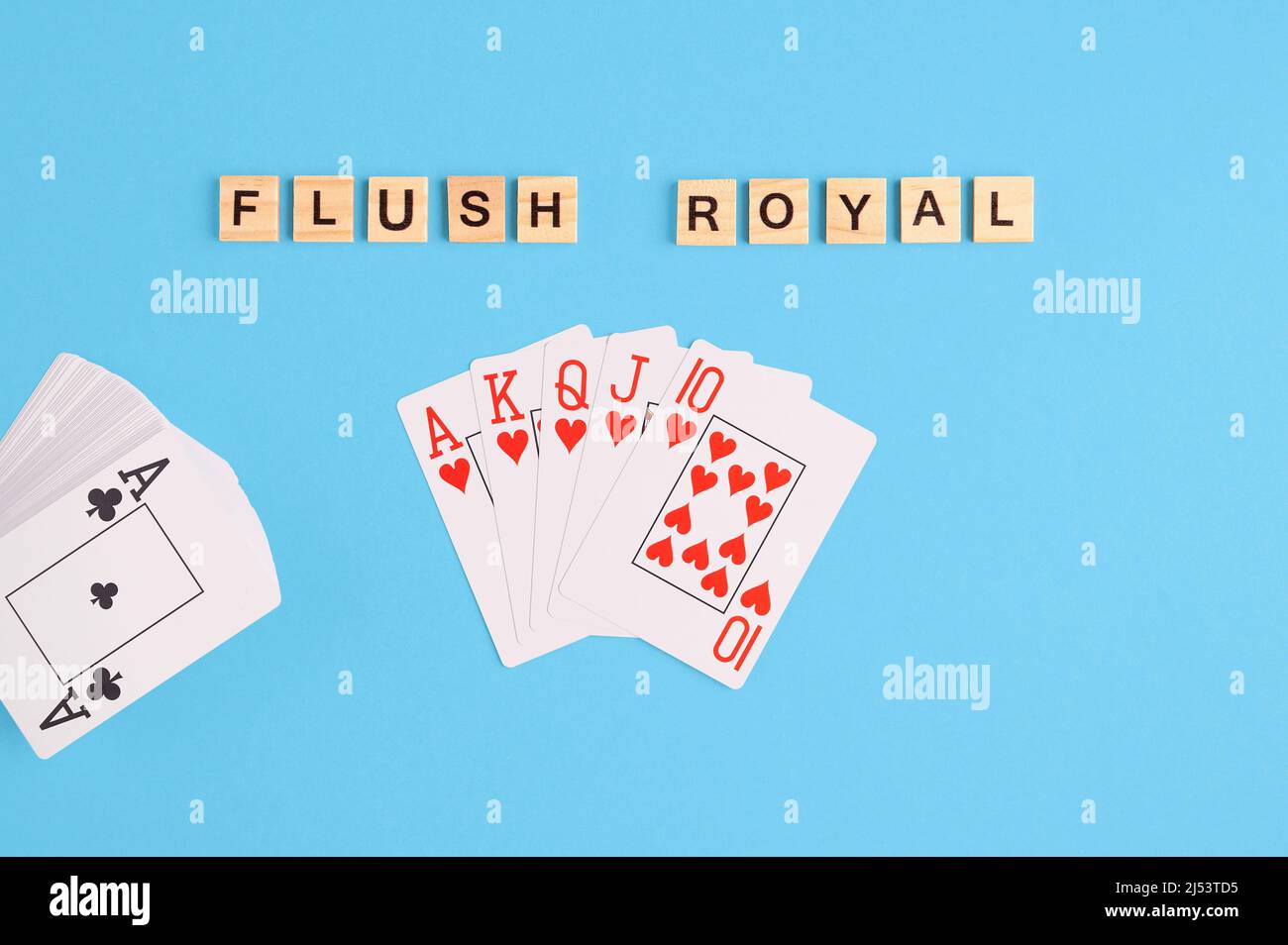 Flush royal combination. Poker Playing Cards on blue background with ...