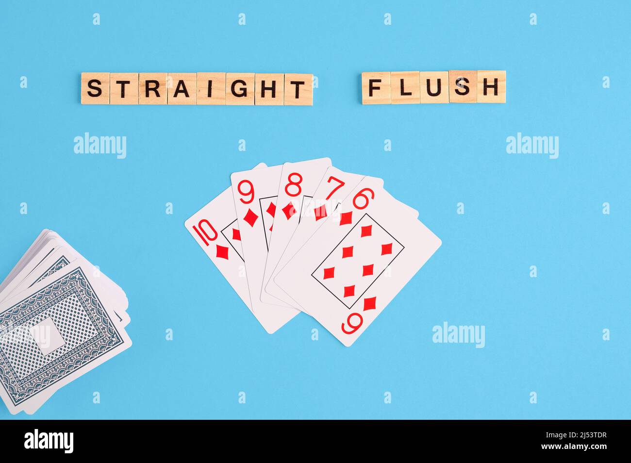 Straight flush combination. Poker Playing Cards on blue background with ...