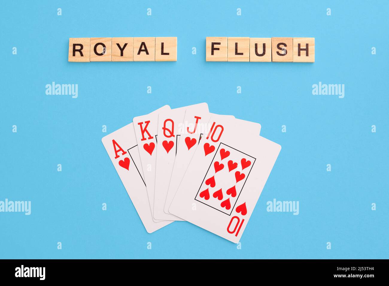 Royal flush combination. Poker Playing Cards on blue background with ...