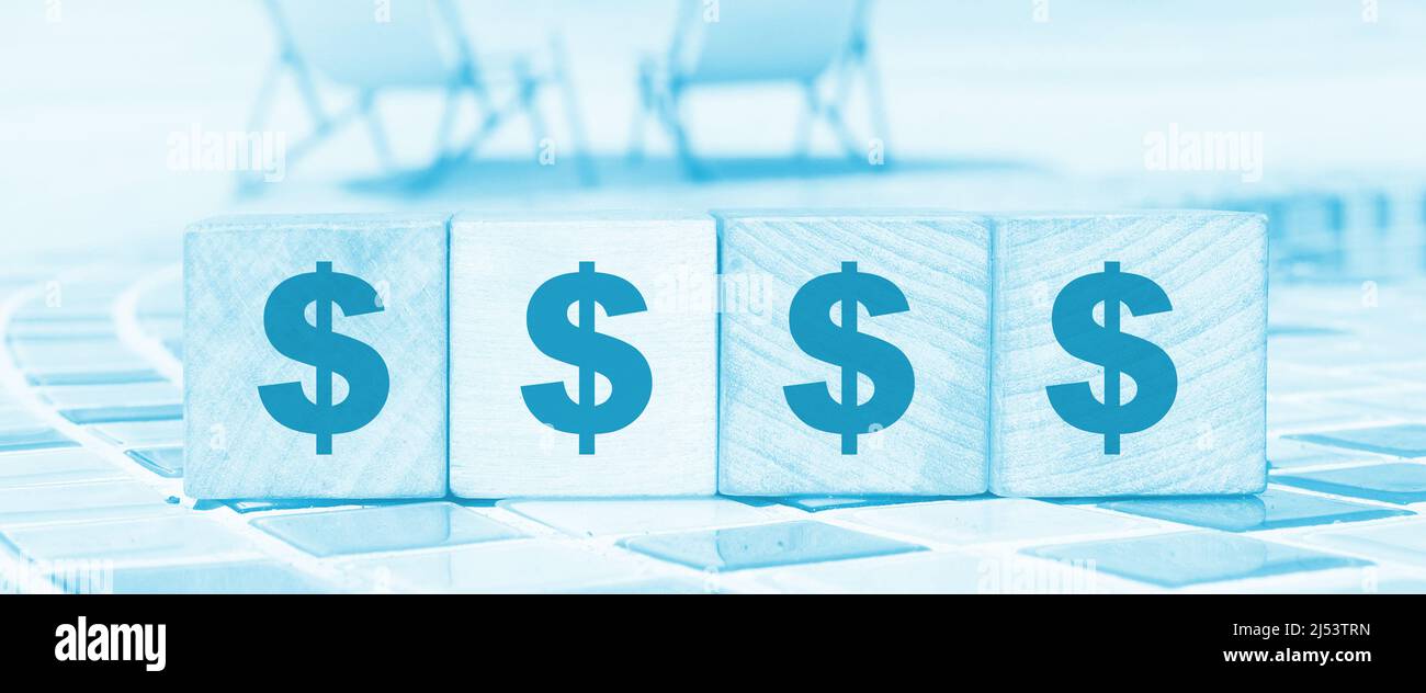 Wooden cubes with dollar sign on ocean beach background. Business ...