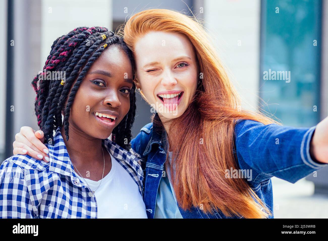 Happy brightful positive moments of two stylish girls Stock Photo - Alamy