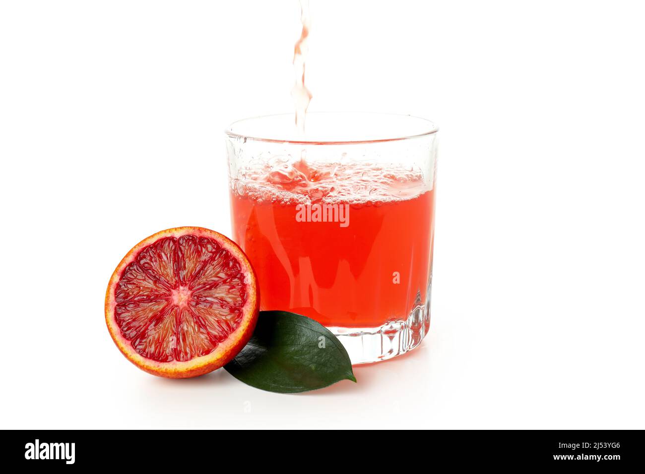 Concept of fresh drink with red orange juice isolated on white ...